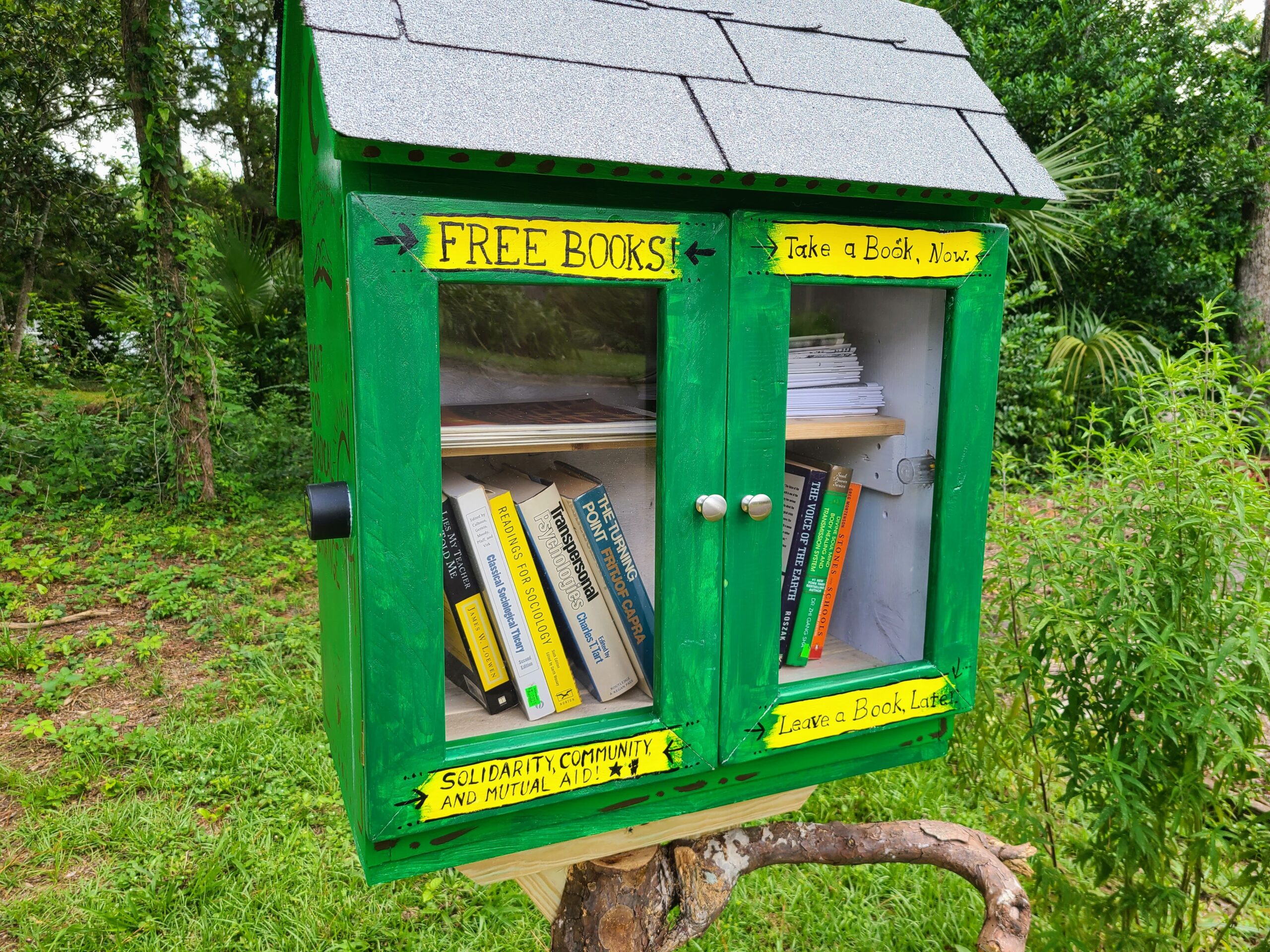Little Green Library - Weeds and Deeds